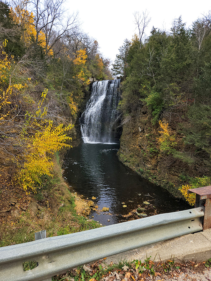 Fall transforms the canyon into a painter's palette of warm hues, making the white cascade pop against nature's most vibrant seasonal wardrobe.