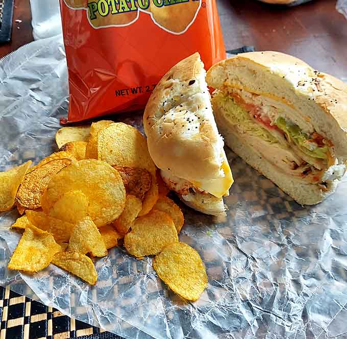 The chip selection features Michigan's own Better Made brand, because when you're already committed to a monster sandwich, you might as well go full local legend.