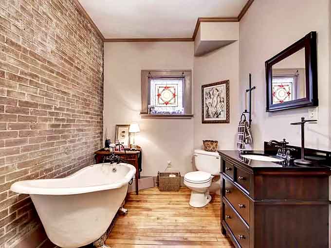 Another bathroom sanctuary where vintage charm meets modern convenience &ndash; cleanliness truly is next to godliness here.