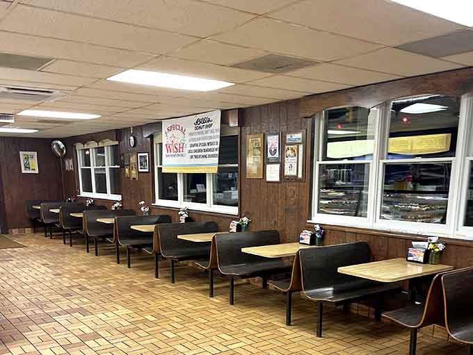 Classic booth seating where generations have sat, sipped coffee, and contemplated which donut to eat next.