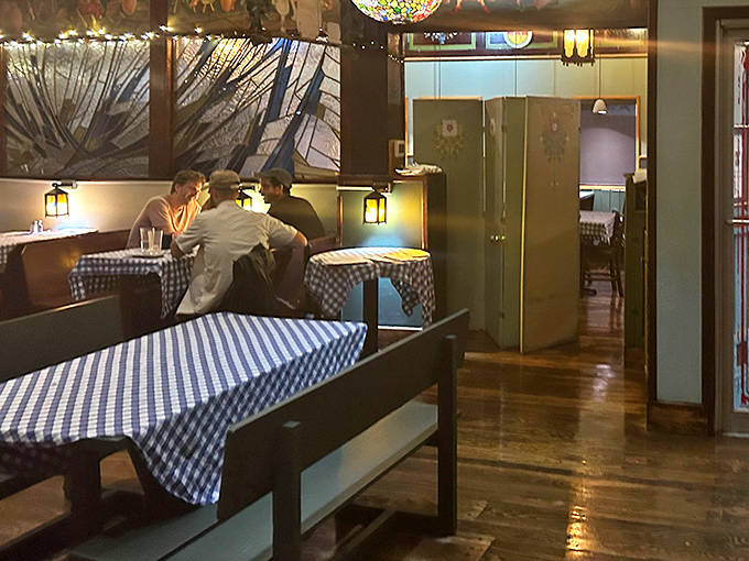 The dining room's old-world charm comes from decades of serving authentic German cuisine in a space that feels both special and comfortable.