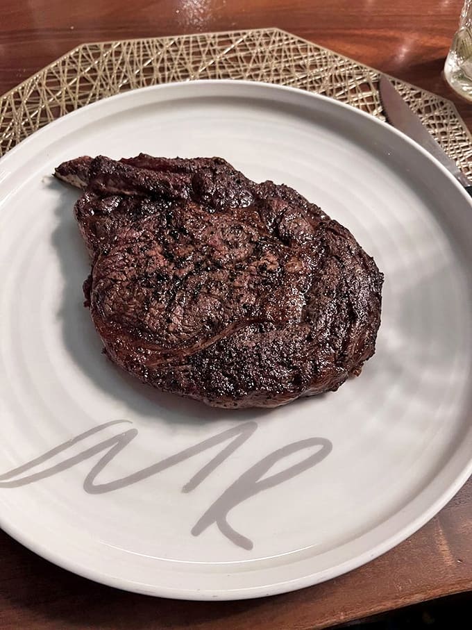 The bone-in ribeye presents itself with the quiet confidence of something that knows exactly how delicious it is &ndash; no explanation necessary.