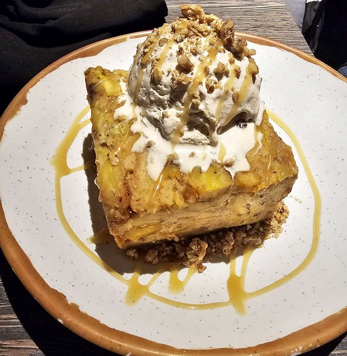 Bread pudding that would make grandmothers weep with joy &ndash; warm, cinnamon-spiced comfort crowned with melting ice cream and caramel drizzle.