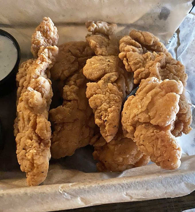 These aren't your school cafeteria chicken fingers &ndash; Brit's version delivers juicy meat in a perfectly seasoned crispy coating that puts fast food to shame.