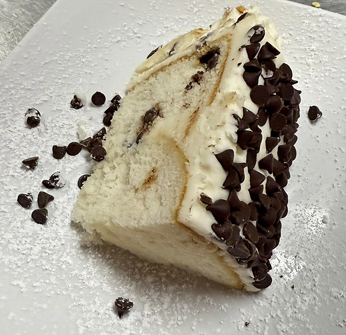 Cannoli cake that would make Sicily proud &ndash; the sweet finale to a perfect pizza experience.