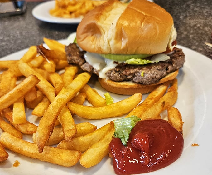 A classic cheeseburger that needs no fancy tricks &ndash; just quality ingredients coming together like a perfectly arranged chord on a well-loved guitar.
