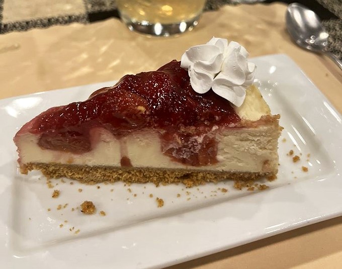 Cherry cheesecake that balances creamy richness with fruit brightness &ndash; the perfect finale to a classic supper club experience.