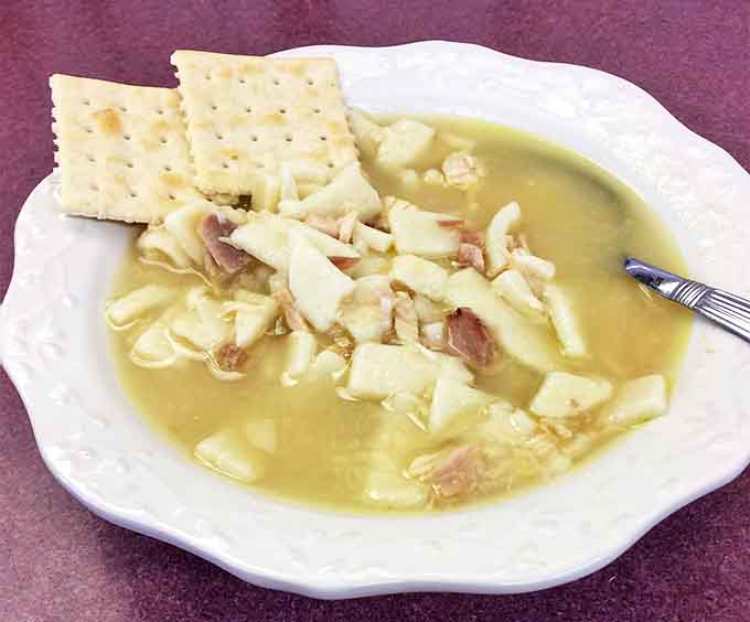 Chicken noodle soup that tastes like someone's grandmother made it with actual chicken and vegetables you can identify without a microscope. Comfort in a bowl.