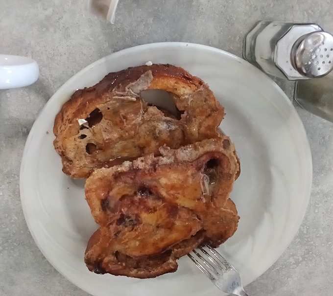 French toast that's had a proper introduction to the griddle &ndash; golden, crispy edges giving way to a tender cinnamon-kissed interior.