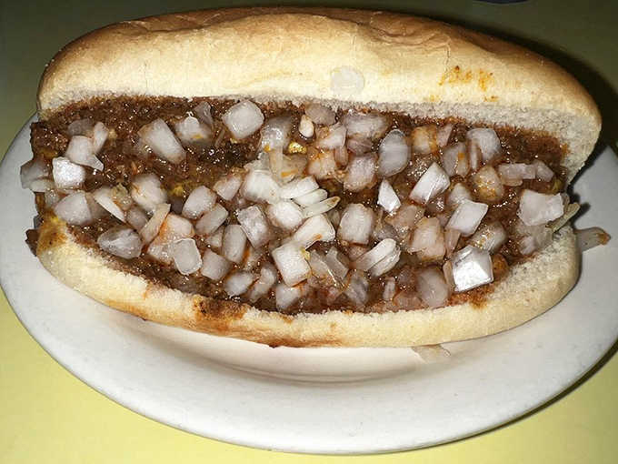 This isn't just any hot dog &ndash; it's a Coney Island tradition with perfectly proportioned meat sauce and a generous scattering of diced onions.