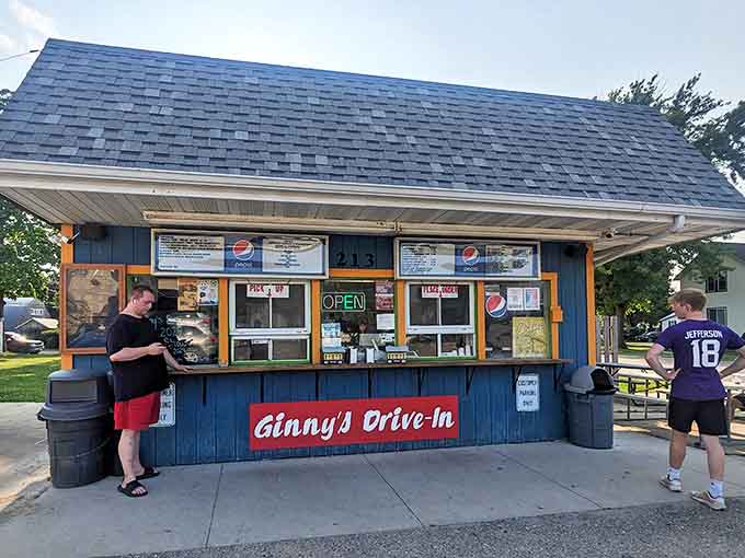 Customers line up at Ginny's service windows, united in the universal pursuit of deliciousness that transcends age and background.