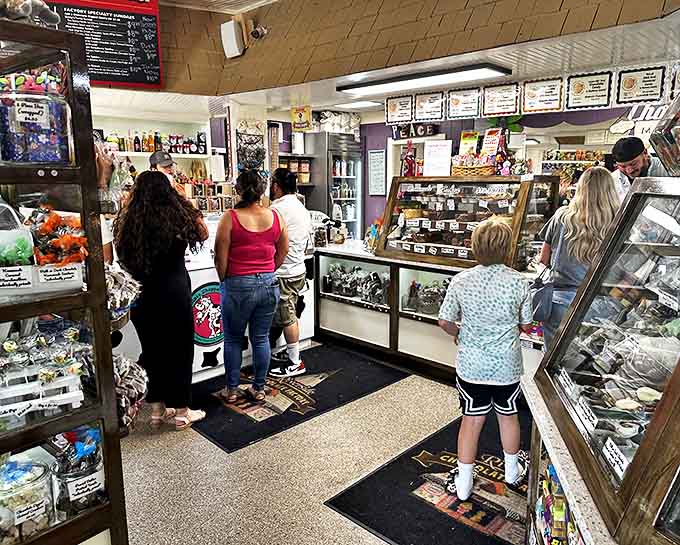 Patrons line up at the counter, experiencing the sweet agony of choice that comes with too many delicious options.