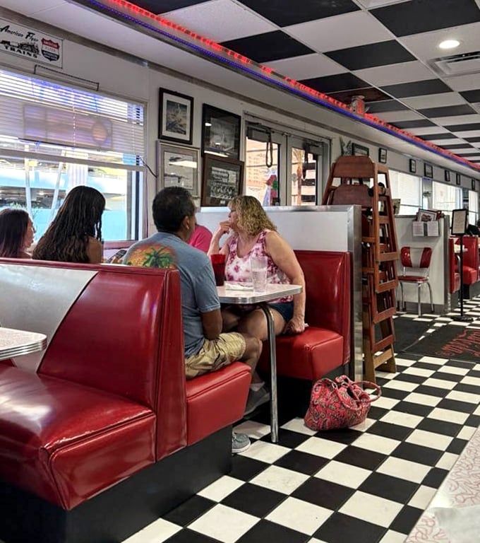 Red vinyl booths cradle conversations and create memories, while diners enjoy that unique communal solitude that only great diners provide.