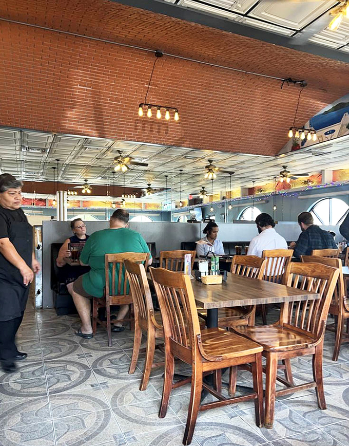 The true measure of a local spot: tables filled with regulars who come for the gyros but stay for the conversation.