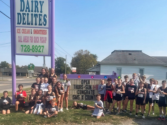 Diners: Victory tastes sweet! Young athletes celebrating with the universal language of ice cream &ndash; a tradition as old as sports itself.