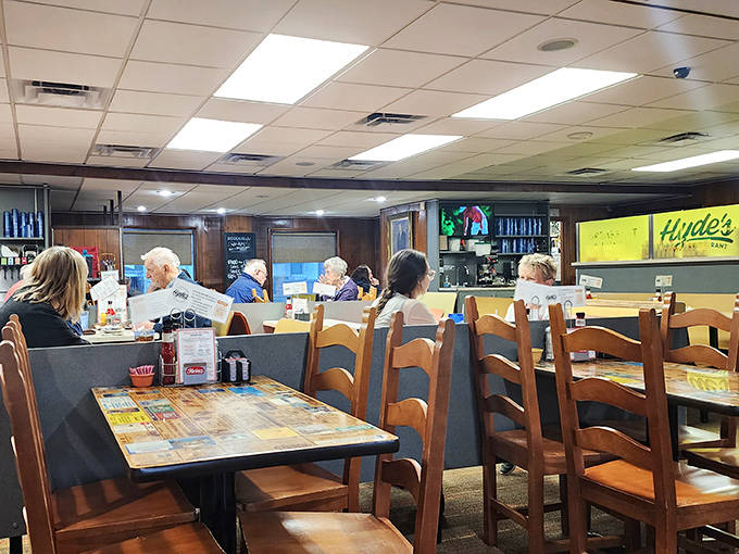 The dining room hums with conversation and clinking silverware &ndash; a community gathering place where regulars and newcomers share the same warm welcome.