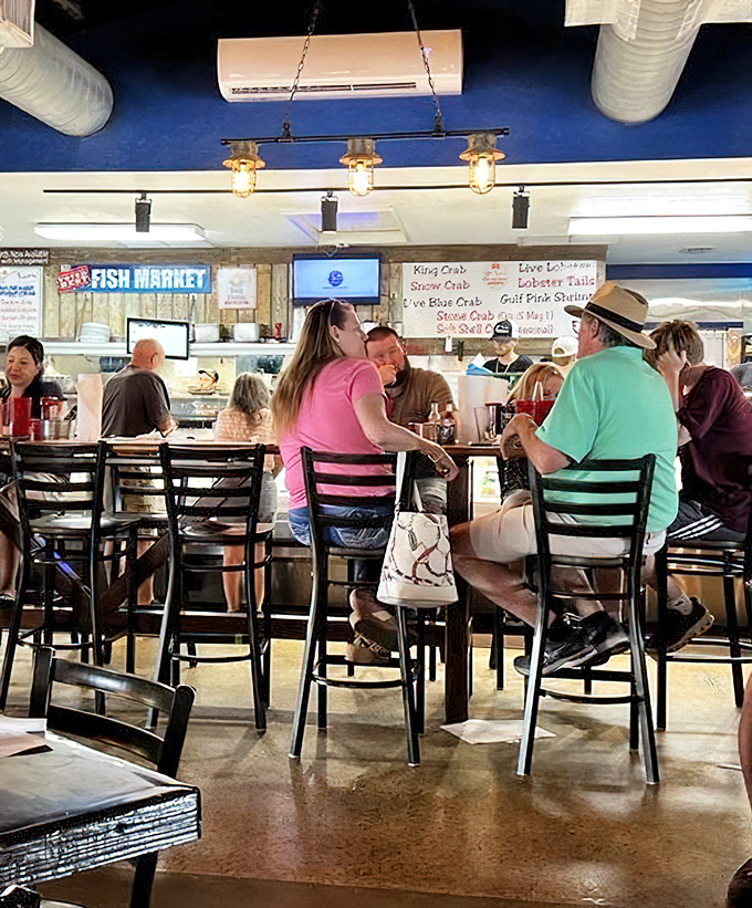 Where fishermen, tourists, and locals gather at the counter, trading tales of the one that got away while waiting for the ones that didn't.
