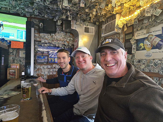 Game day at Mary's means multiple screens, passionate fans, and the occasional spontaneous cheer that rattles the dollar bills.