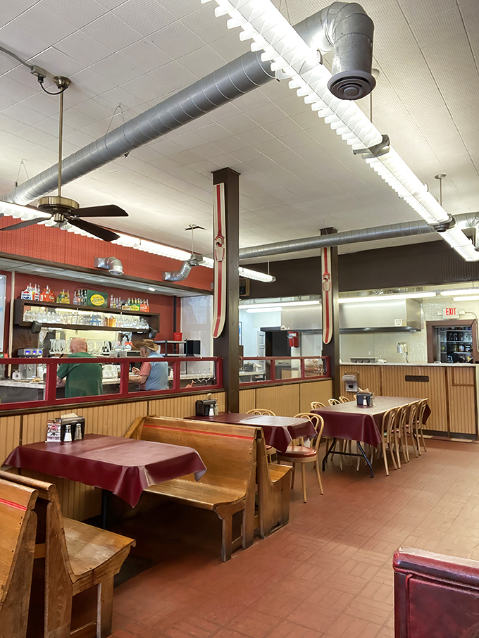 Wooden booths and burgundy tablecloths invite lingering conversations&mdash;this isn't fast food, it's food worth slowing down for.