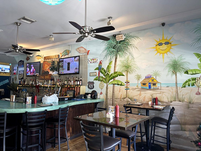 Paper lanterns cast a warm glow over diners as beach murals create the perfect backdrop for seafood indulgence.