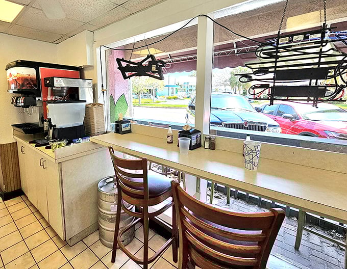 The cozy dining area offers a front-row seat to paradise, where conversations flow as freely as the Cuban coffee.