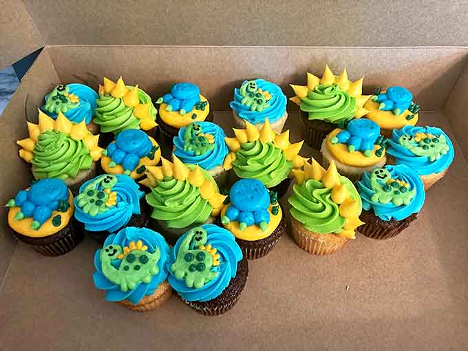 Prehistoric cuteness erupts from these playful cupcakes, where bright colors and childlike imagination transform simple treats into edible adventures.