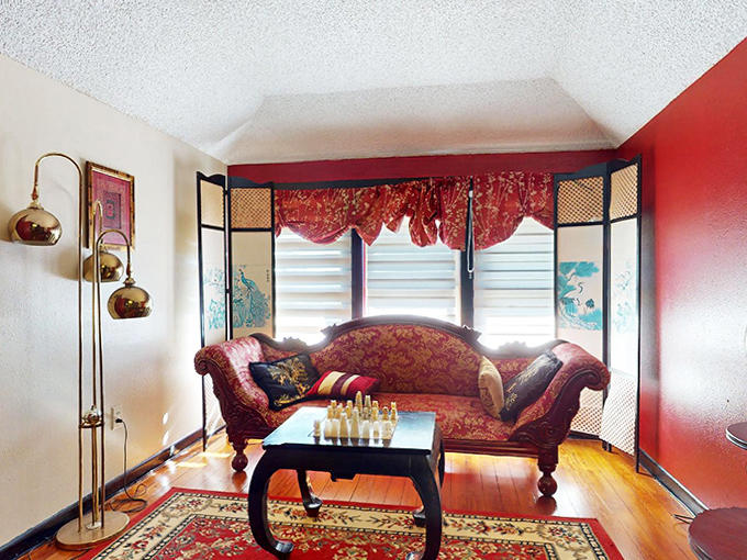 The elegant lounge area features a fainting couch that's seen its fair share of Victorian-era gossip and modern-day naps.