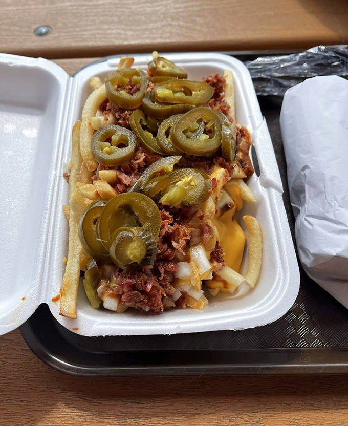 Loaded fries topped with jalape&ntilde;os and cheese &ndash; because sometimes potatoes need to dress up fancy for a night out.