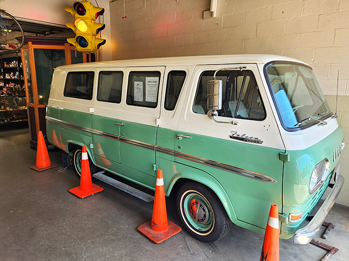 This mint-condition Ford Econoline van in turquoise and white looks ready for a cross-country adventure with The Beach Boys on the 8-track.