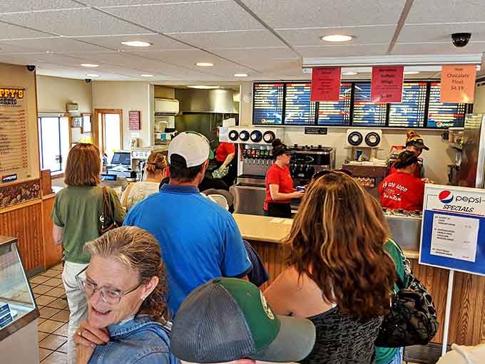 The lunch rush at Happy's &ndash; where locals and travelers alike line up for their turn at Minnesota's tastiest time machine.