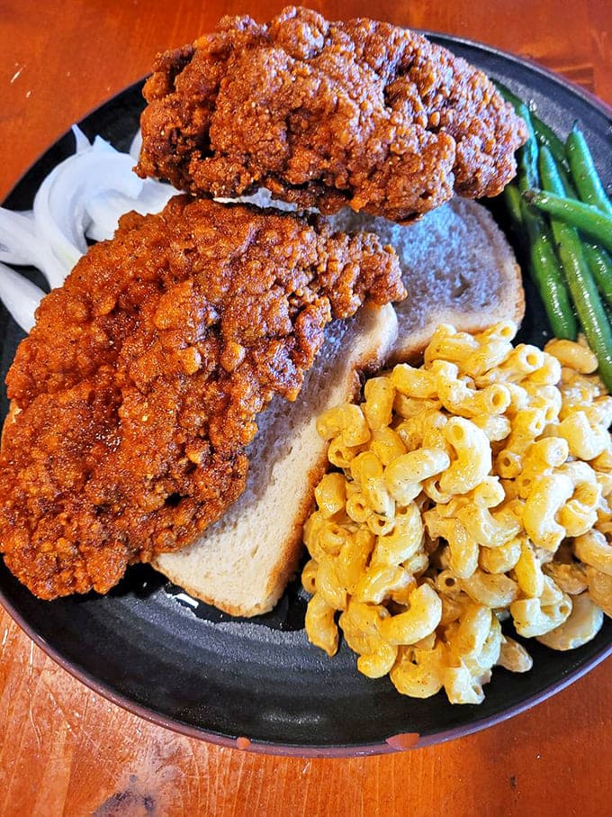 Hot chicken that brings the heat, cooled by creamy mac and cheese &ndash; a plate that proves comfort food can still surprise you.