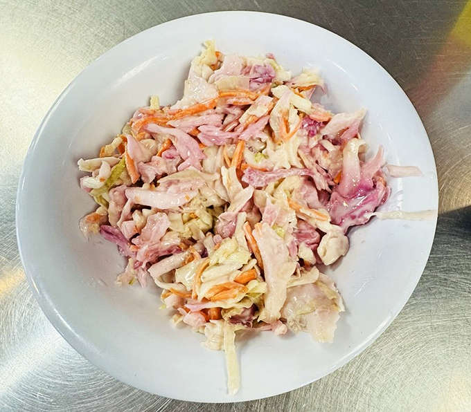 House-made coleslaw that finds the perfect balance between creamy and crunchy &ndash; not an afterthought, but a side dish with purpose.