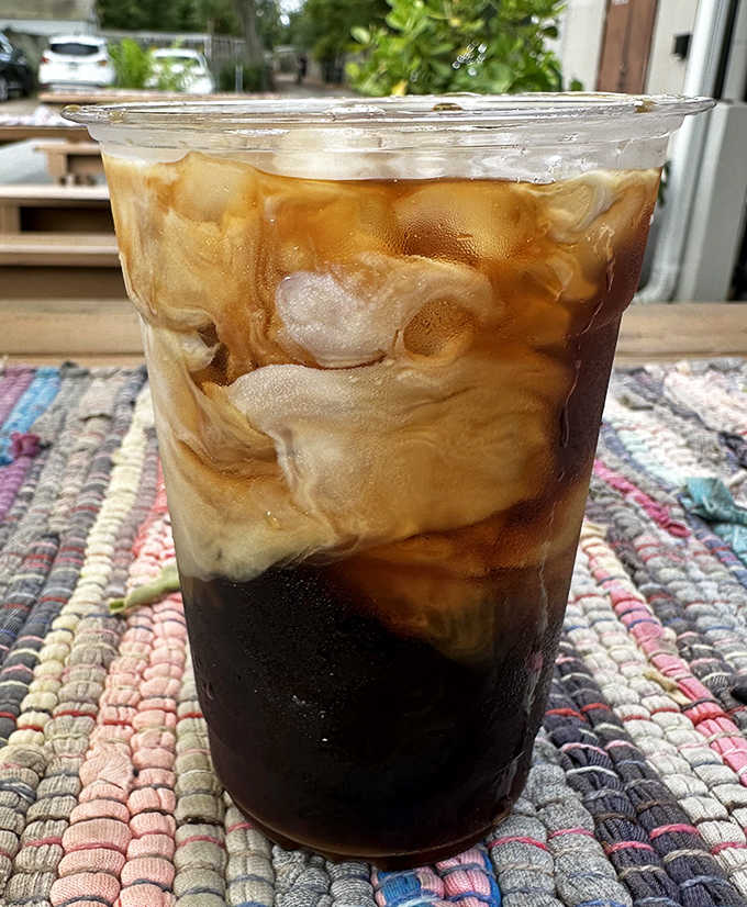 Iced Coffee: The perfect companion to sweet pastries, this cold brew swirls with cream like a caffeinated work of abstract art.