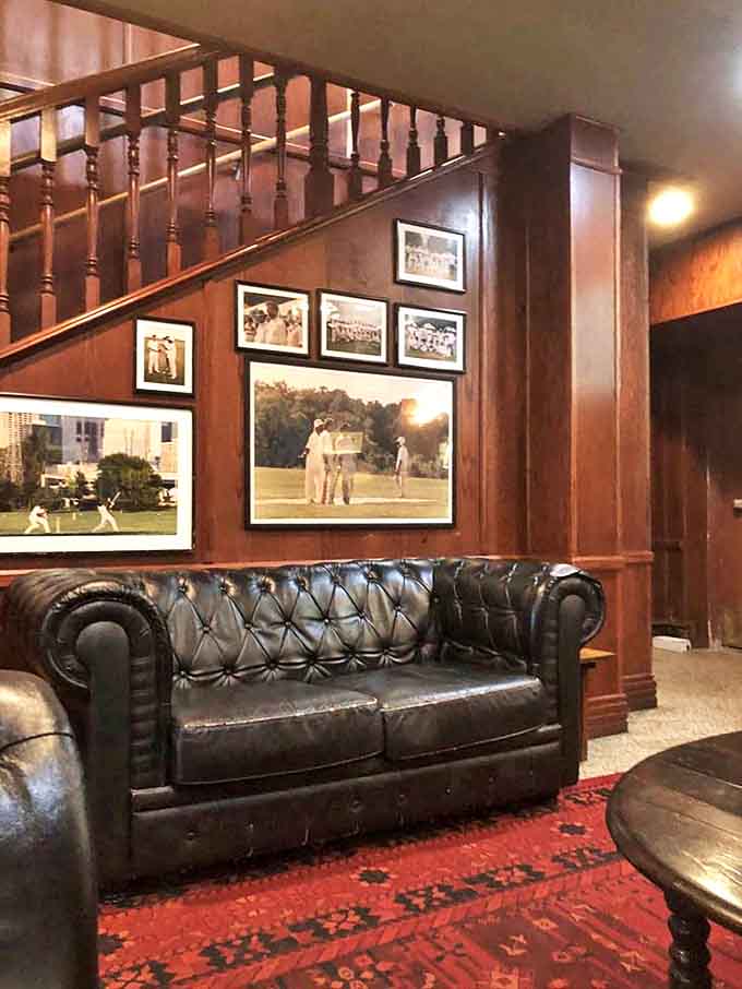 Rich wood paneling, leather seating, and cricket memorabilia create nooks so cozy you'll want to settle in until closing time.