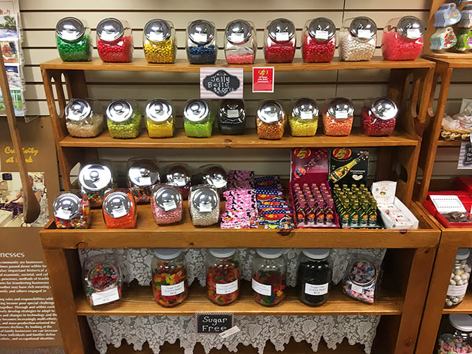 Jelly Belly jars line the shelves like a rainbow of possibilities, inviting you to mix, match, and create your perfect flavor combination.
