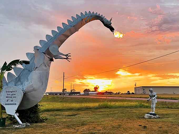 At sunset, the dragon's fire display becomes even more dramatic, silhouetted against the painted Illinois sky in a photographer's dream scene.
