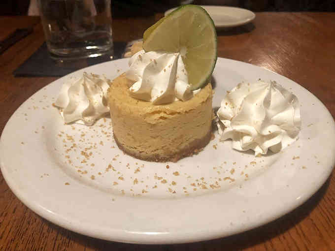Key lime pie that strikes the perfect balance between sweet and tart, topped with clouds of whipped cream &ndash; Florida sunshine in dessert form.
