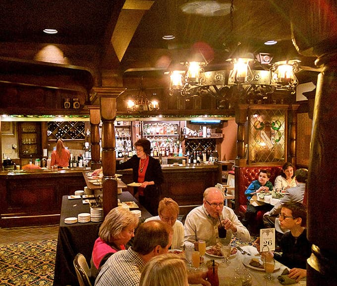 Medieval feasting meets modern dining as guests enjoy the warm glow of chandeliers and the even warmer glow of perfectly cooked steaks.