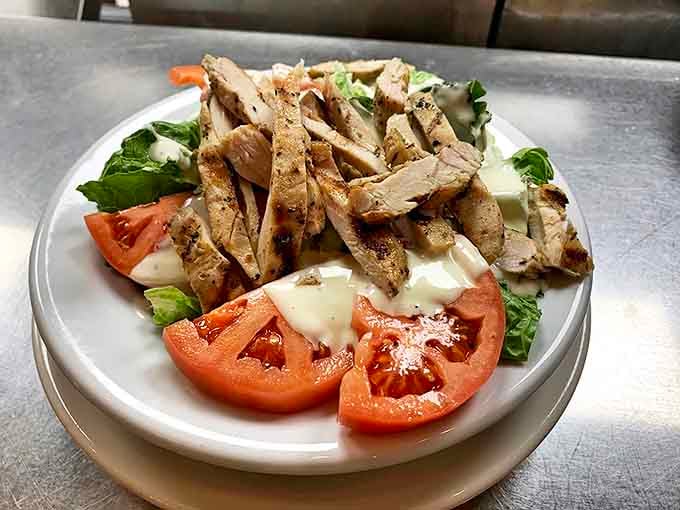 Even the lighter fare gets the Lou Mitchell's treatment, with grilled chicken and fresh vegetables proving breakfast isn't their only superpower.