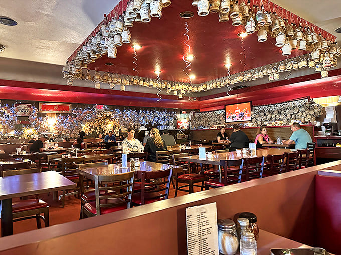 The dining room hums with conversation and laughter &ndash; a symphony of satisfaction conducted by generations of pizza lovers.