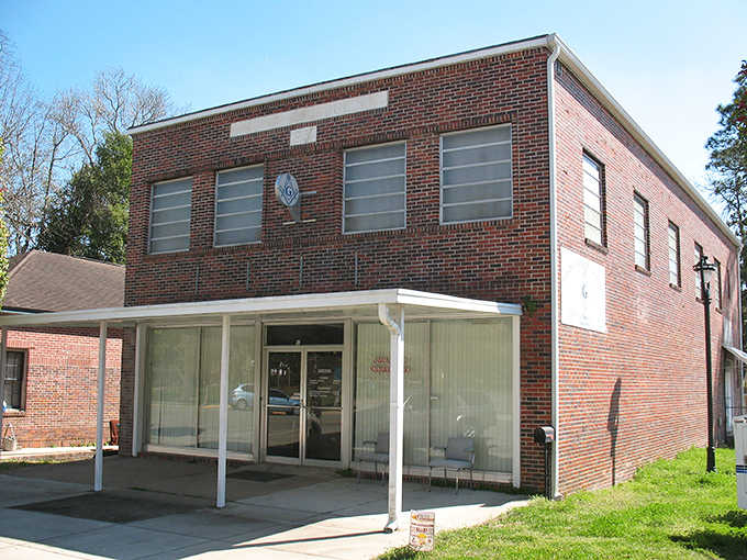 The Masonic Lodge building represents a time when organizations built structures meant to last centuries, not just fiscal quarters.