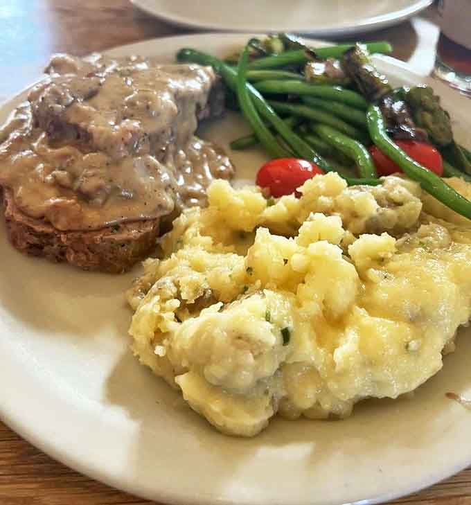 Meatloaf that would make your grandmother jealous, swimming in gravy with sides that know their supporting role and play it perfectly.