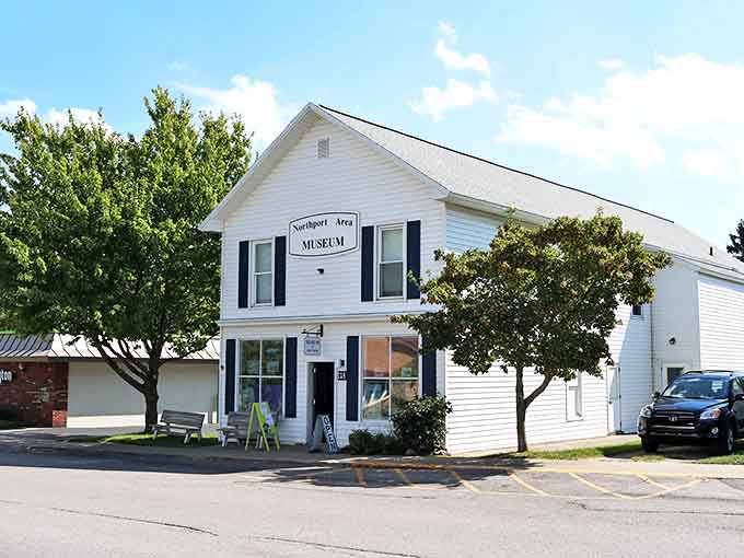 The Northport Area Museum preserves yesterday's memories in a classic white building that stands as timekeeper for this lakeside community.
