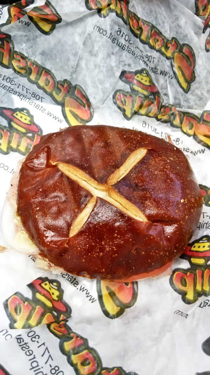 Peppered ham on buttered pretzel bread sounds like someone's fever dream, but tastes like pure genius in sandwich form.