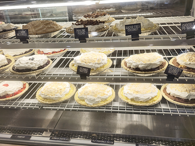 The pie case at Des Dutch Essenhaus isn't just a display &ndash; it's a museum of edible art where cream pies stand tall and fruit fillings bubble beneath perfect lattice crusts.