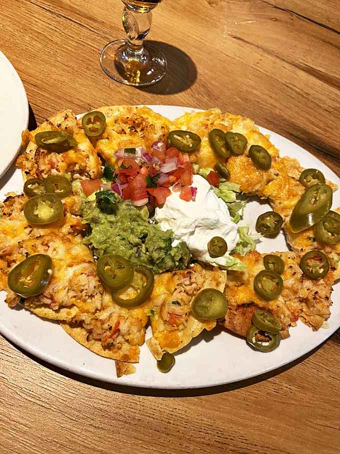 These nachos aren't just loaded &ndash; they're carrying excess baggage fees worth of toppings, with jalape&ntilde;os providing the perfect spicy runway lights.