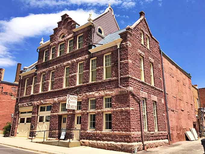 The magnificent Pipestone County Museum building showcases the distinctive local quartzite that gives the town its architectural character.