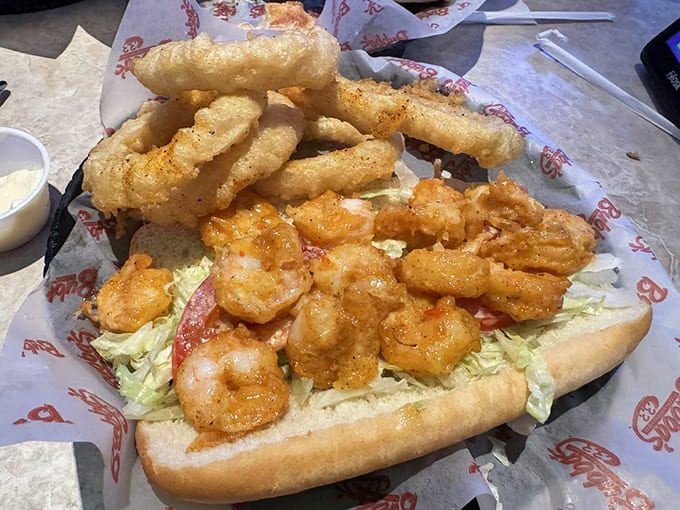 The Po'boy sandwich piled high with fried goodness, proving that Southern and Cuban flavors can absolutely coexist beautifully.