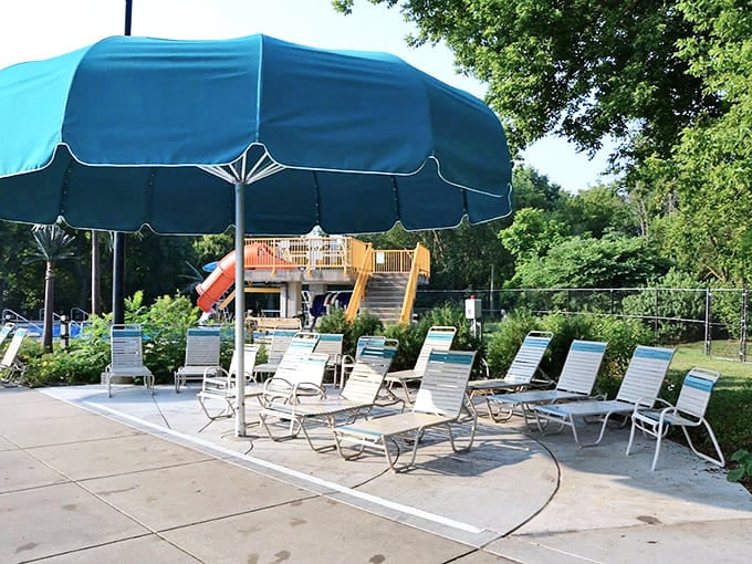 Empty lounge chairs patiently wait for their next occupants – prime real estate in this chlorinated kingdom.