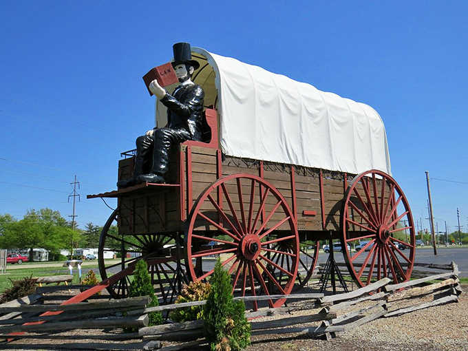 Against a brilliant blue Illinois sky, the wagon's white canvas top pops with picture-perfect contrast for roadtrippers seeking the ultimate souvenir photo.